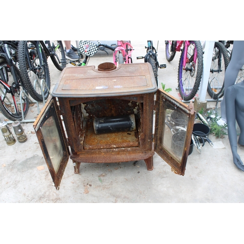 A HEAVY CAST IRON LOG BURNER