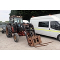 AN INTERNATIONAL 784 TRACTOR WITH 3360E LOADER PALLET FORKS GOOD BRAKES ...