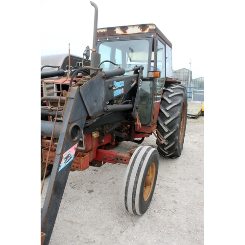 AN INTERNATIONAL 784 TRACTOR WITH 3360E LOADER PALLET FORKS GOOD BRAKES ...