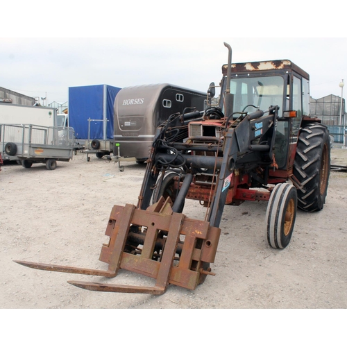 AN INTERNATIONAL 784 TRACTOR WITH 3360E LOADER PALLET FORKS GOOD BRAKES ...