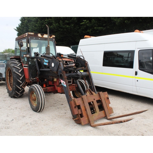 AN INTERNATIONAL 784 TRACTOR WITH 3360E LOADER PALLET FORKS GOOD BRAKES ...