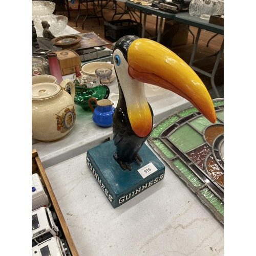 A CAST GUINNESS TOUCAN, HEIGHT 19CM
