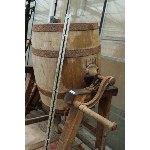A VINTAGE WOODEN BUTTER CHURN WITH STAND AND PLAQUE BEARING THE LABEL ...
