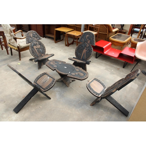 A SET OF FOUR AFRICAN HARDWOOD BIRTHING TYPE CHAIRS AND A SMALL ...