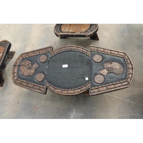 A SET OF FOUR AFRICAN HARDWOOD BIRTHING TYPE CHAIRS AND A SMALL ...