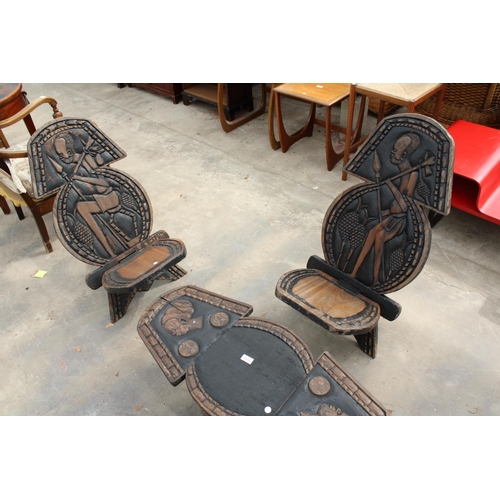 A SET OF FOUR AFRICAN HARDWOOD BIRTHING TYPE CHAIRS AND A SMALL ...