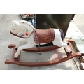 A VINTAGE PLASTIC ROCKING HORSE