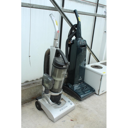 TWO HOOVER VACUUM CLEANERS