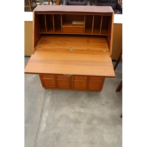 A RETRO TEAK NATHAN BUREAU WITH DRAWER AND CUPBOARDS TO BASE, 33" WIDE
