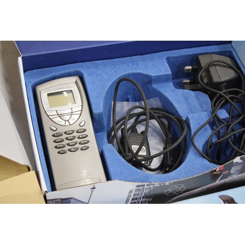 FOUR MOBILE PHONES IN BOXES TO INCLUDE A NOKIA 3220, A NOKIA 9210, A ...