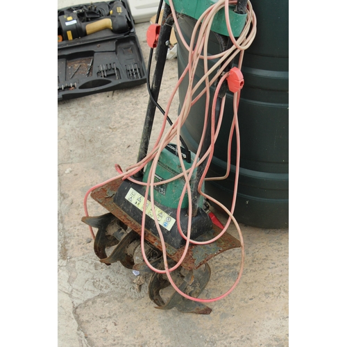 A PLASTIC WATER TANK AND A QUALCAST ELECTRIC ROTAVATOR