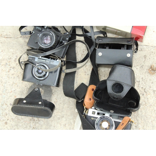AN ASSORTMENT OF PHOTOGRAPHY EQUIPMENT TO INCLUDE A COSMIC 35 CAMERA, A ...