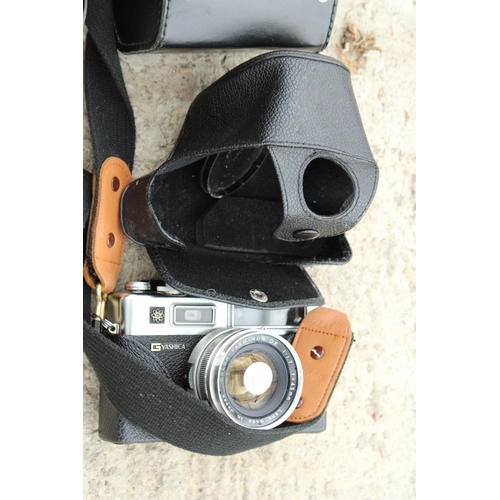 AN ASSORTMENT OF PHOTOGRAPHY EQUIPMENT TO INCLUDE A COSMIC 35 CAMERA, A ...