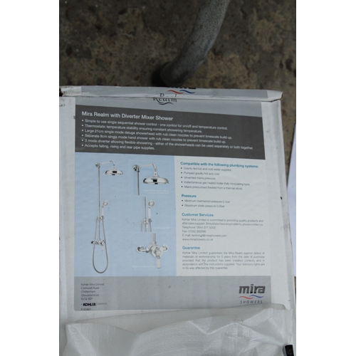AN AS NEW AND BOXED MIRA REALM SHOWER WITH MIXER TAPS