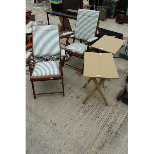 TWO TEAK FOLDING GARDEN CHAIRS AND TWO FOLDING TABLES