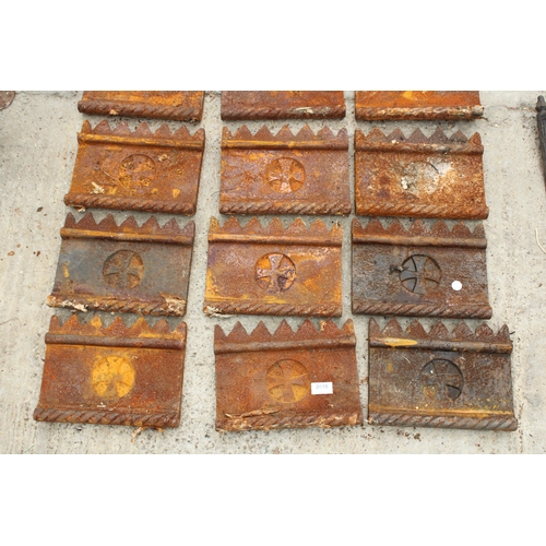 SIXTEEN DECORATIVE CAST IRON GARDEN EDGING
