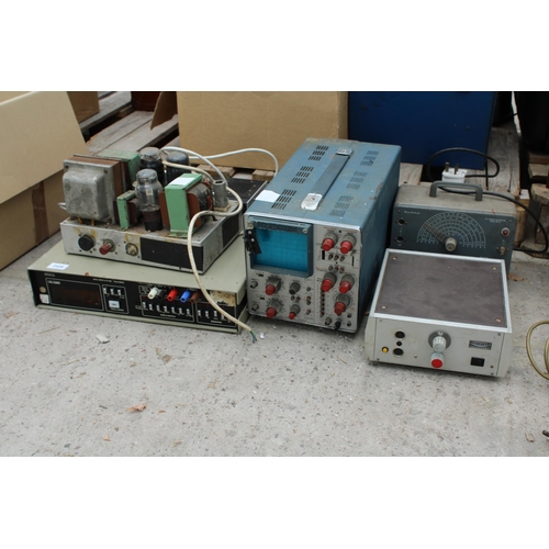 AN ASSORTMENT OF VARIOUS VINTAGE RADIO SIGNAL MACHINES