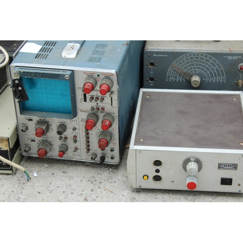 AN ASSORTMENT OF VARIOUS VINTAGE RADIO SIGNAL MACHINES