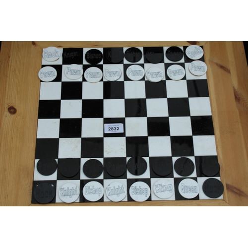 A PINE LAMP TABLE WITH INSET CHESS BOARD AND DISC SHAPED PLAYERS, 21 ...