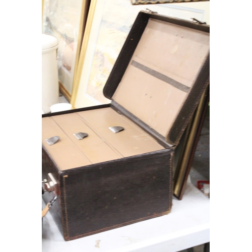 A VINTAGE FILING SYSTEM IN A SUITCASE