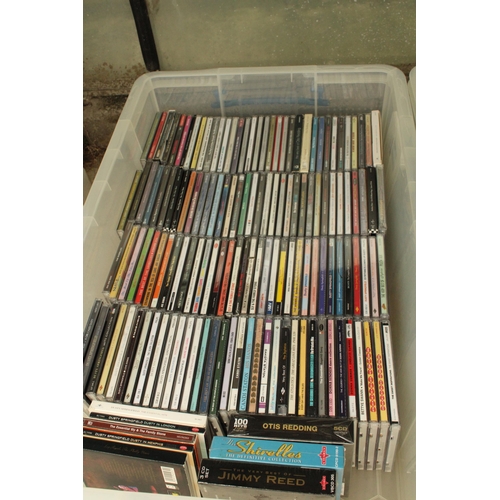 TWO LARGE PLASTIC STORAGE BOXES CONTAINING AN ASSORTMENT OF CDS