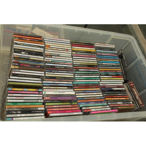 TWO LARGE LIDDED STORAGE BOXES CONTAING A LARGE ASSORTMENT OF CDS