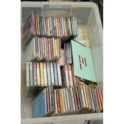 TWO PLASTIC LIDDED STORAGE BOXES WITH A LARGE ASSORTMENT OF CDS
