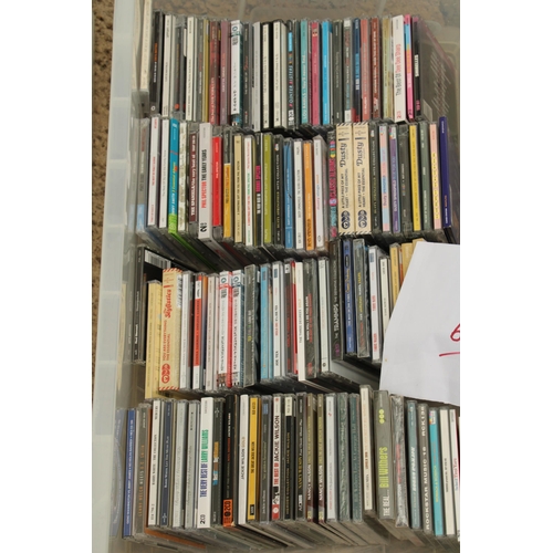 TWO PLASTIC LIDDED STORAGE BOXES WITH A LARGE ASSORTMENT OF CDS