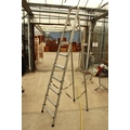 A SEVEN RUNG ALUMINIUM STEP LADDER