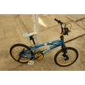 A CHILDS SCHWINN REPO BMX BIKE WITH REAR STUNT PEGS