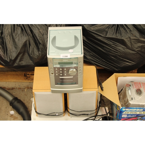 AN ASSORTMENT OF ITEMS TO INCLUDE A SANYO STEREO SYSTEM WITH TWO ...