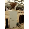 A WHITE UPRIGHT FRIDGE FREEZER