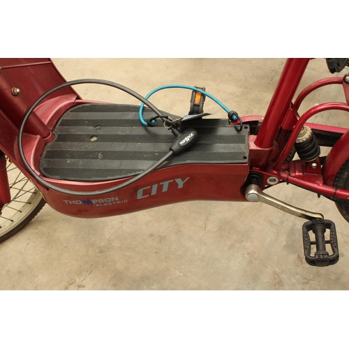 A THOMPSON ELECTRIC BIKE COMPLETE WITH KEY