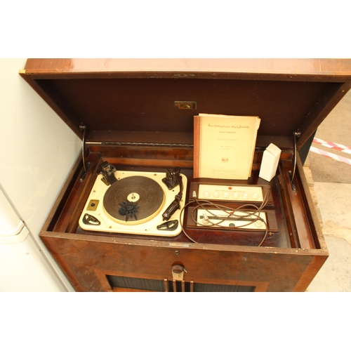 A RETRO TEAK RADIOGRAM WITH GARRARD RECORD DECK