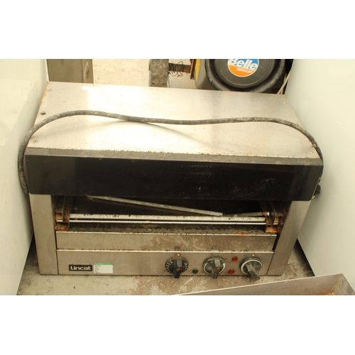 A STAINLESS STEEL COUNTER TOP GRILL AND A FURTHER GRIDDLE