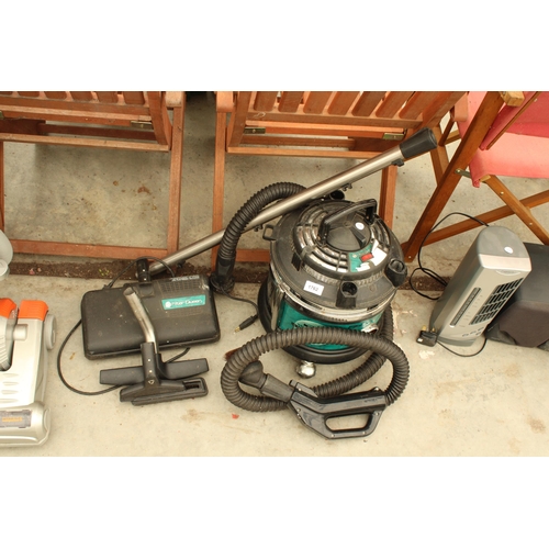 A FILTER QUEEN VACUUM CLEANER WITH ATTATCHMENTS
