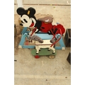 A VINTAGE WOODEN MICKEY MOUSE ROCKING HORSE AND A FURTHER PUSH ALONG HORSE