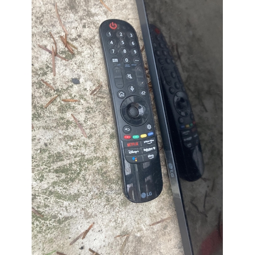 AN LG 43" TELEVISION WITH REMOTE CONTROL