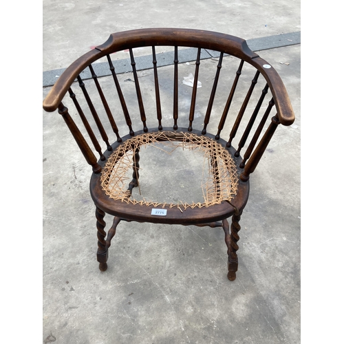 A MID 20TH CENTURY TUB CHAIR WITH SPINDLE BACK AND BARLEY TWIST LEGS ...