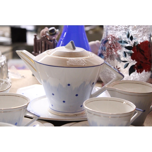 A HANDPAINTED ART DECO STYLE PALISSY BLUE POLKA DOT TEASET TO INCLUDE A ...