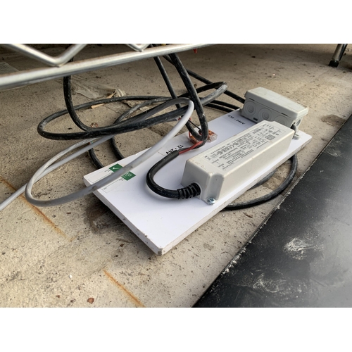 A LARGE ILLUMINATED BOSS SIGN