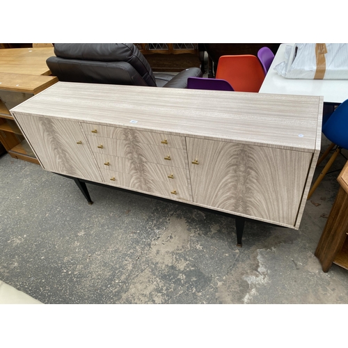 A RETRO MELAMINE BERRY FURNITURE COCKTAIL SIDEBOARD ENCLOSING FOUR ...