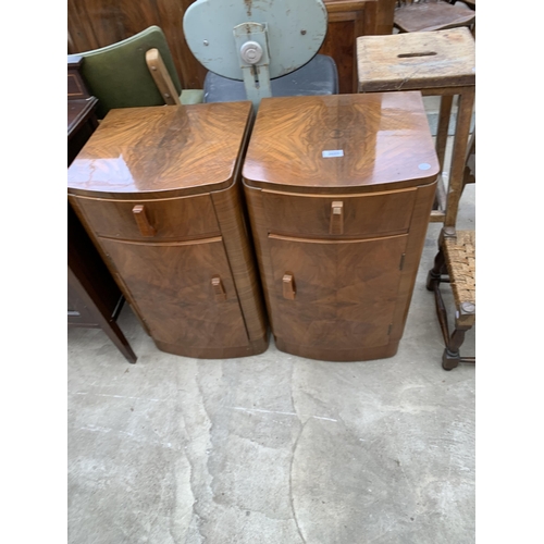 A PAIR OF WALNUT ART DECO BOW FRONTED BEDSIDE LOCKERS
