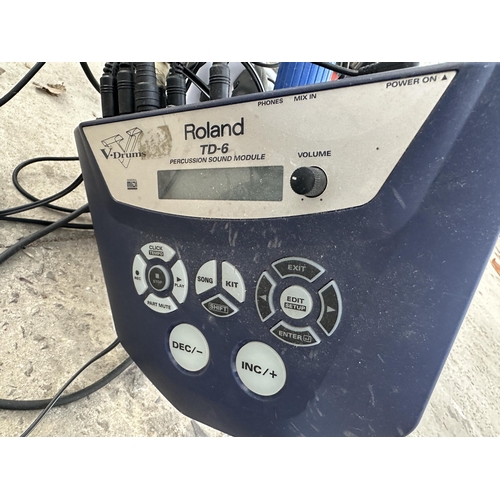 A ROLAND ELECTRIC DRUM KIT WITH TD-6 PERCUSSION SOUND MODULE
