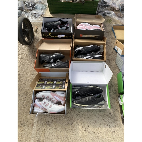 AN ASSORTMENT OF FOOTBALL BOOTS AND TRAINERS
