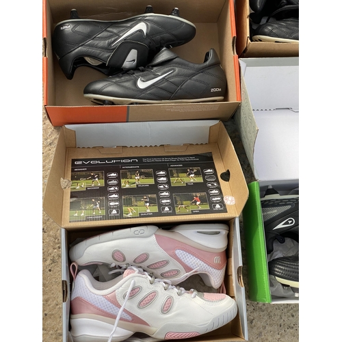 AN ASSORTMENT OF FOOTBALL BOOTS AND TRAINERS