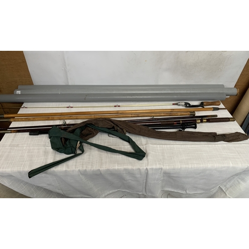 AN ASSORTMENT OF FISHING ITEMS TO INCLUDE ROD EXTENSIONS, TUBES AND BAGS