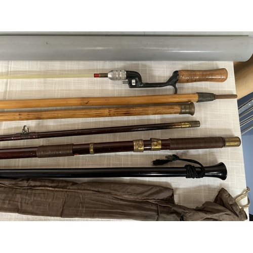 AN ASSORTMENT OF FISHING ITEMS TO INCLUDE ROD EXTENSIONS, TUBES AND BAGS