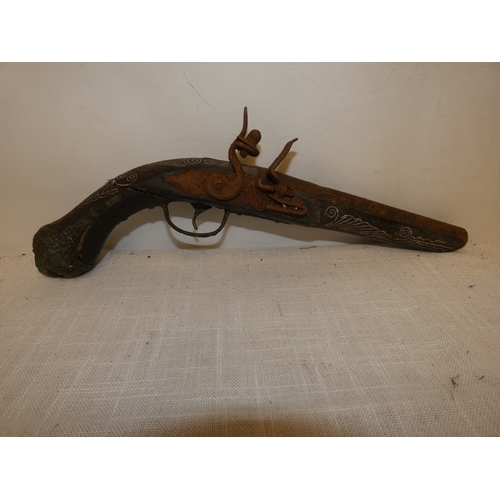 A VINTAGE INDIAN FLINTLOCK PISTOL, 19CM BARREL, LENGTH 34CM (A/F)