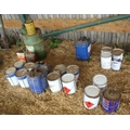 A QUANTITY OF PAINT AND OIL, APPROX. 22 + VAT